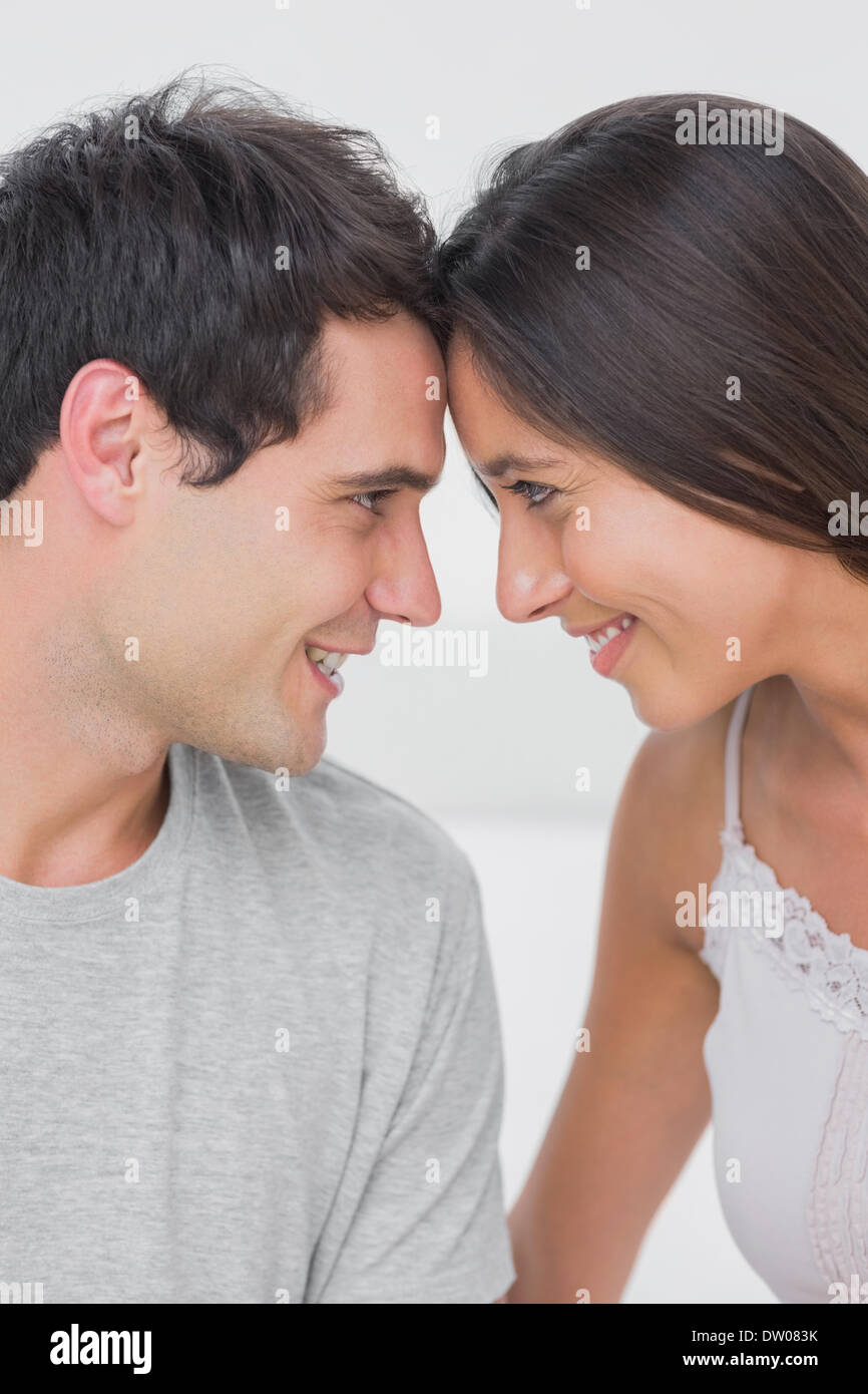 Beautiful couple facing each other Stock Photo - Alamy