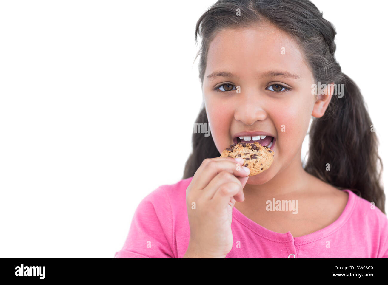 Little girl eating cookie hi-res stock photography and images - Alamy