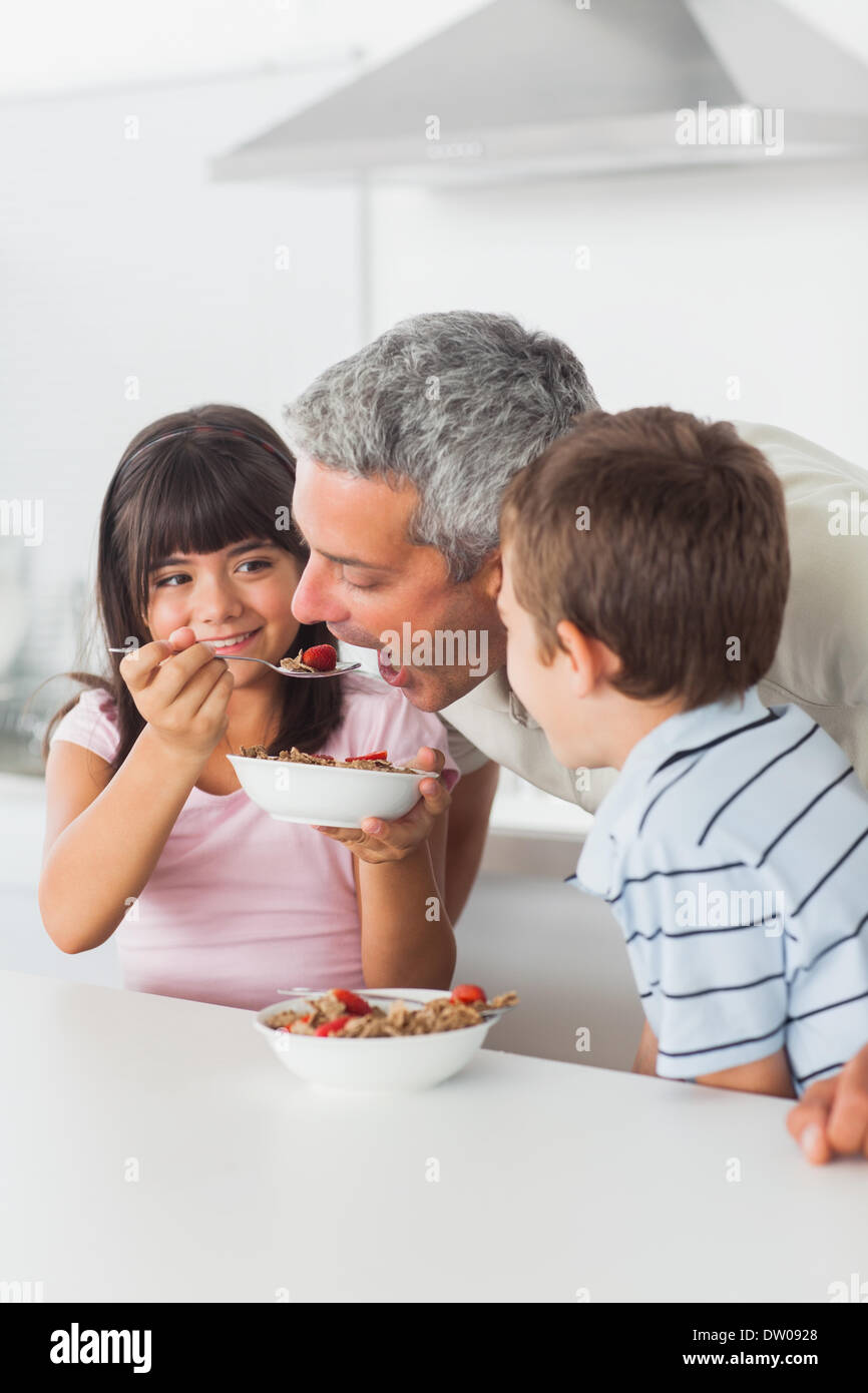 Feeding daughter father sharing hi-res stock photography and images - Alamy