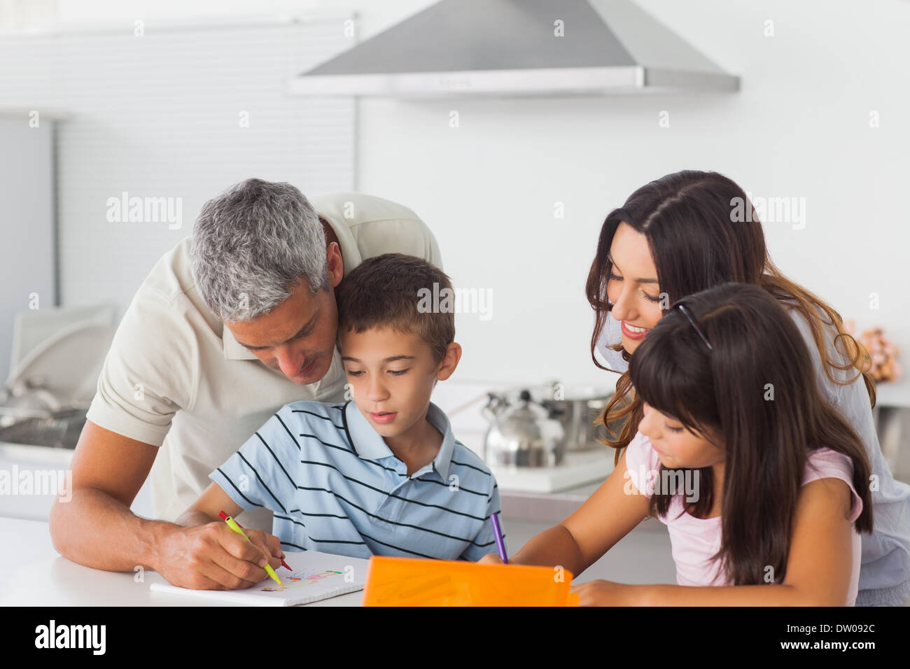 Mother daughter drawing kitchen table hi-res stock photography and ...