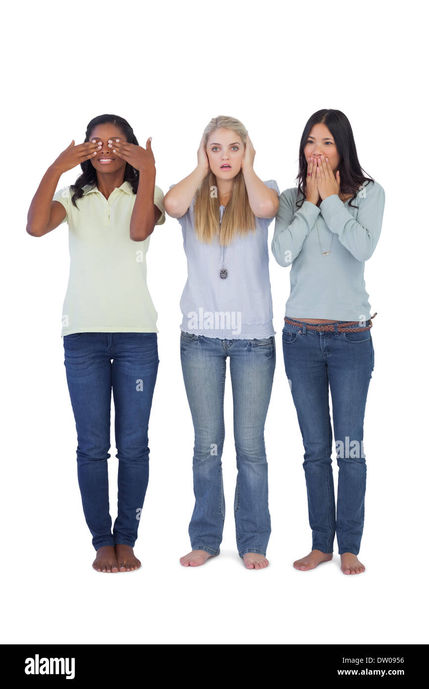 Young women acting out three wise monkeys Stock Photo - Alamy
