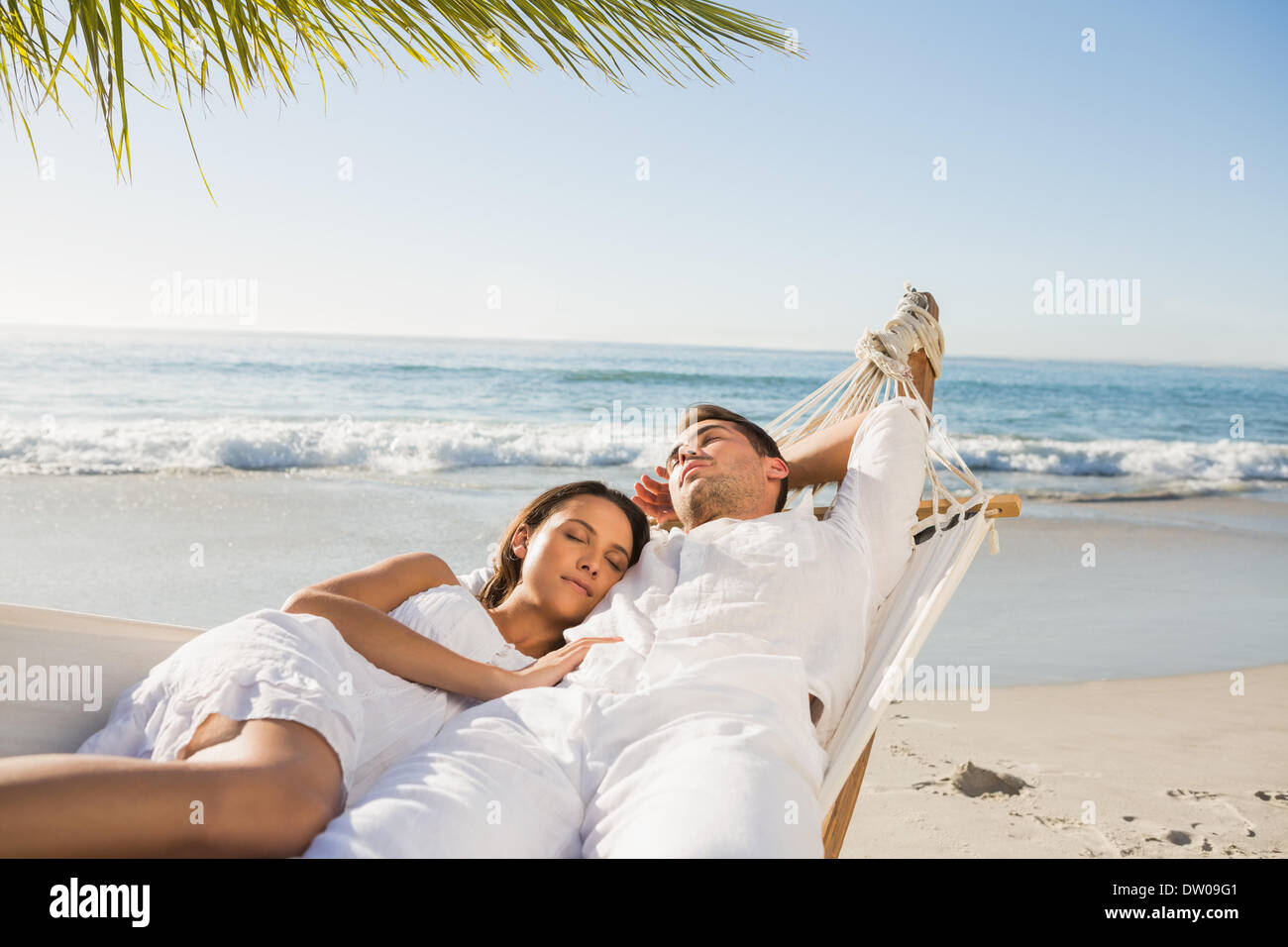Calm couple napping in a hammock Stock Photo - Alamy