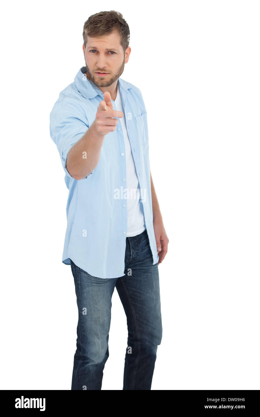 Attractive model pointing to camera Stock Photo - Alamy