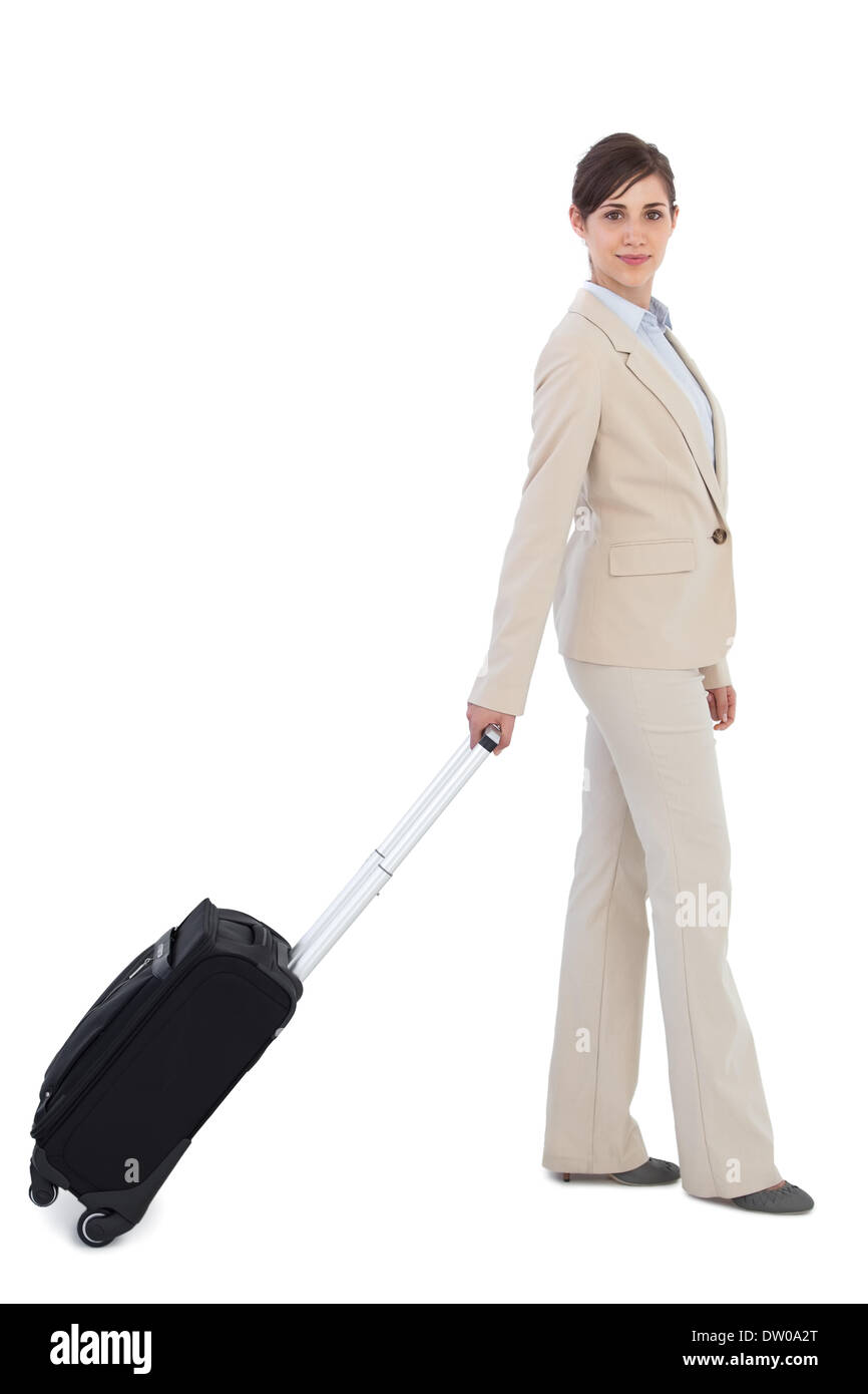 Pulling luggage Cut Out Stock Images & Pictures - Alamy