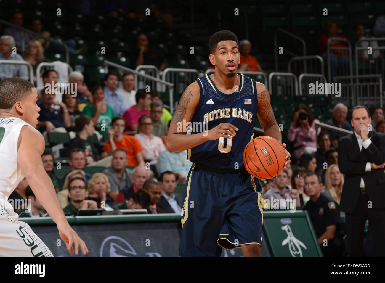 Coral Gables, FL, USA. 22nd Feb, 2014. Eric Atkins #0 of Notre Dame in ...