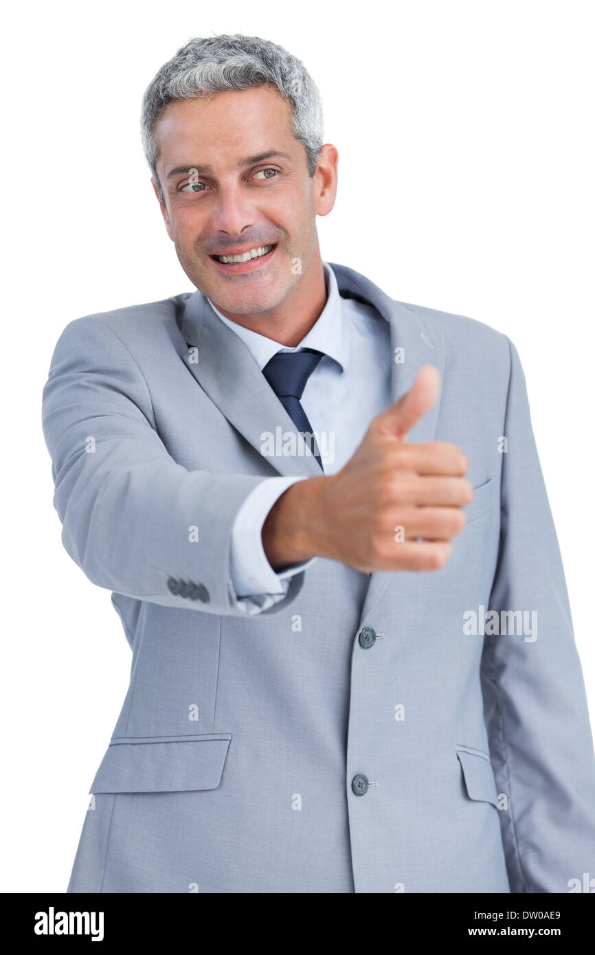 Handsome businessman reaching handshake hi-res stock photography and images - Alamy