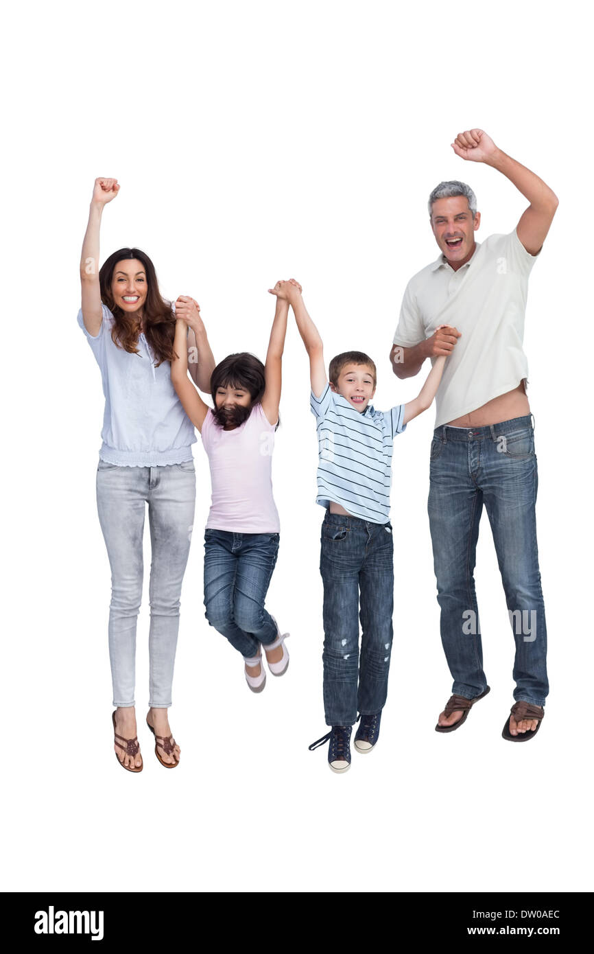 Cute girl jumping in parents hi-res stock photography and images - Alamy