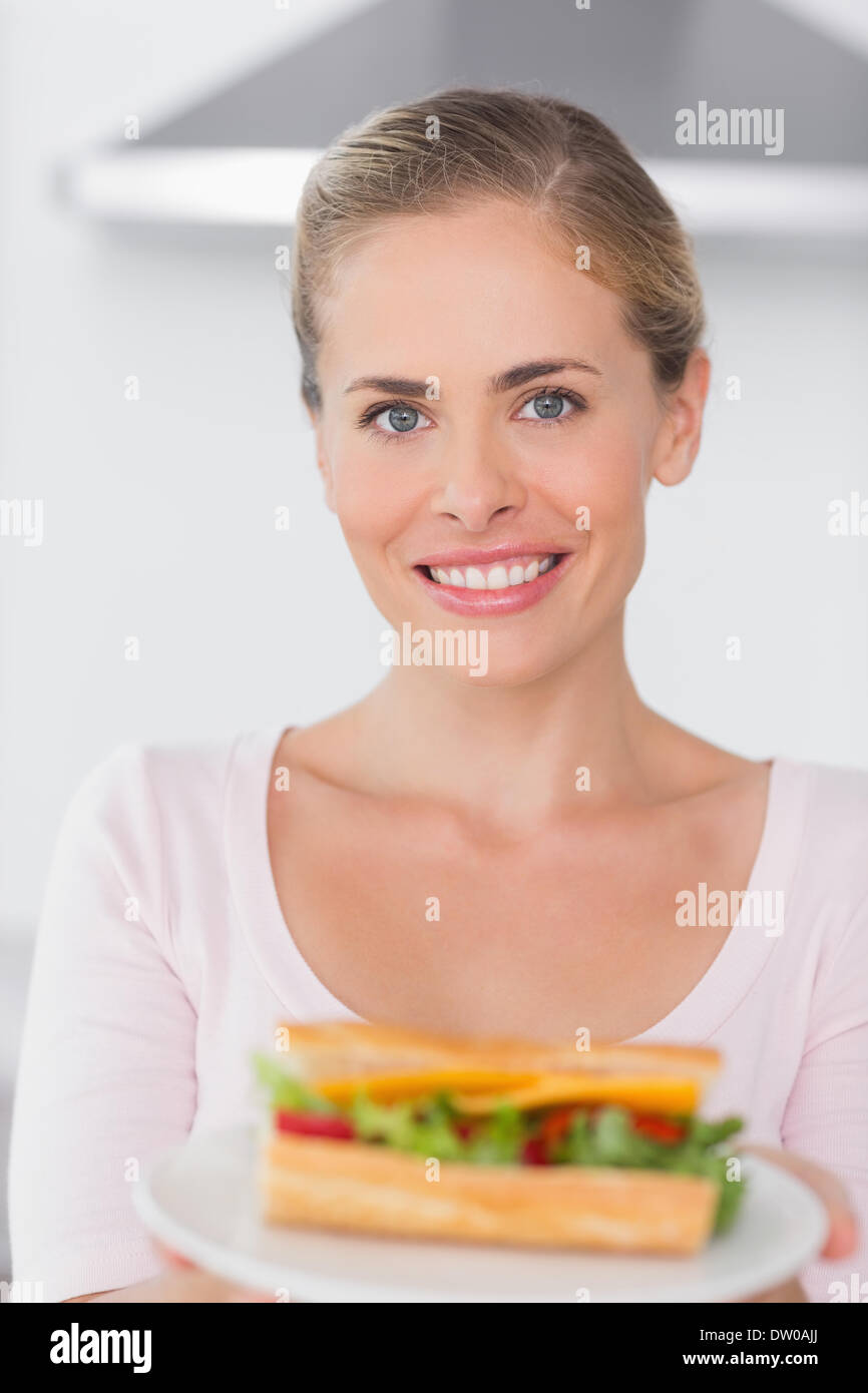 Pretty blonde with sandwich Stock Photo - Alamy