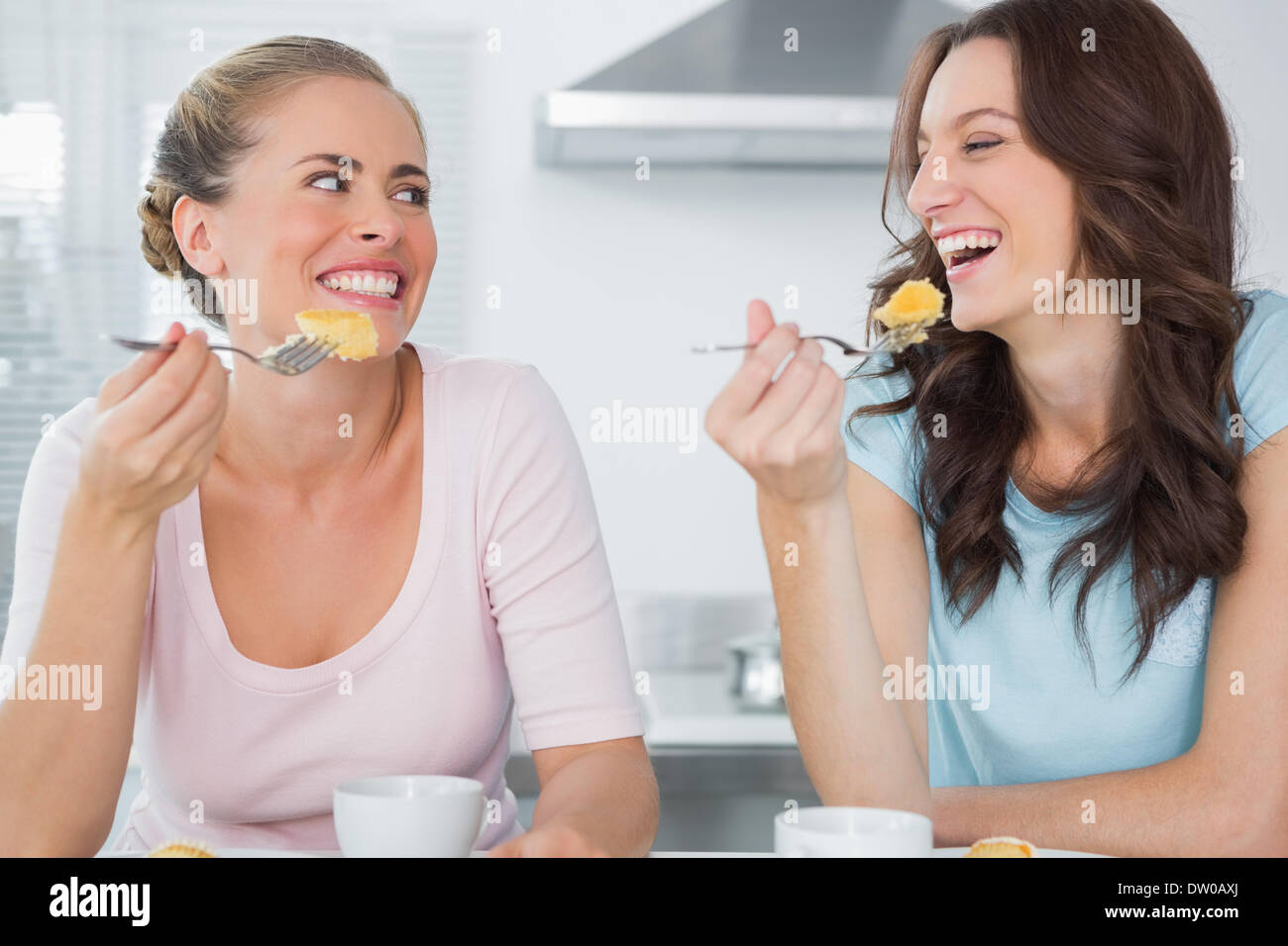 Attractive blonde woman eating cake hi-res stock photography and images ...