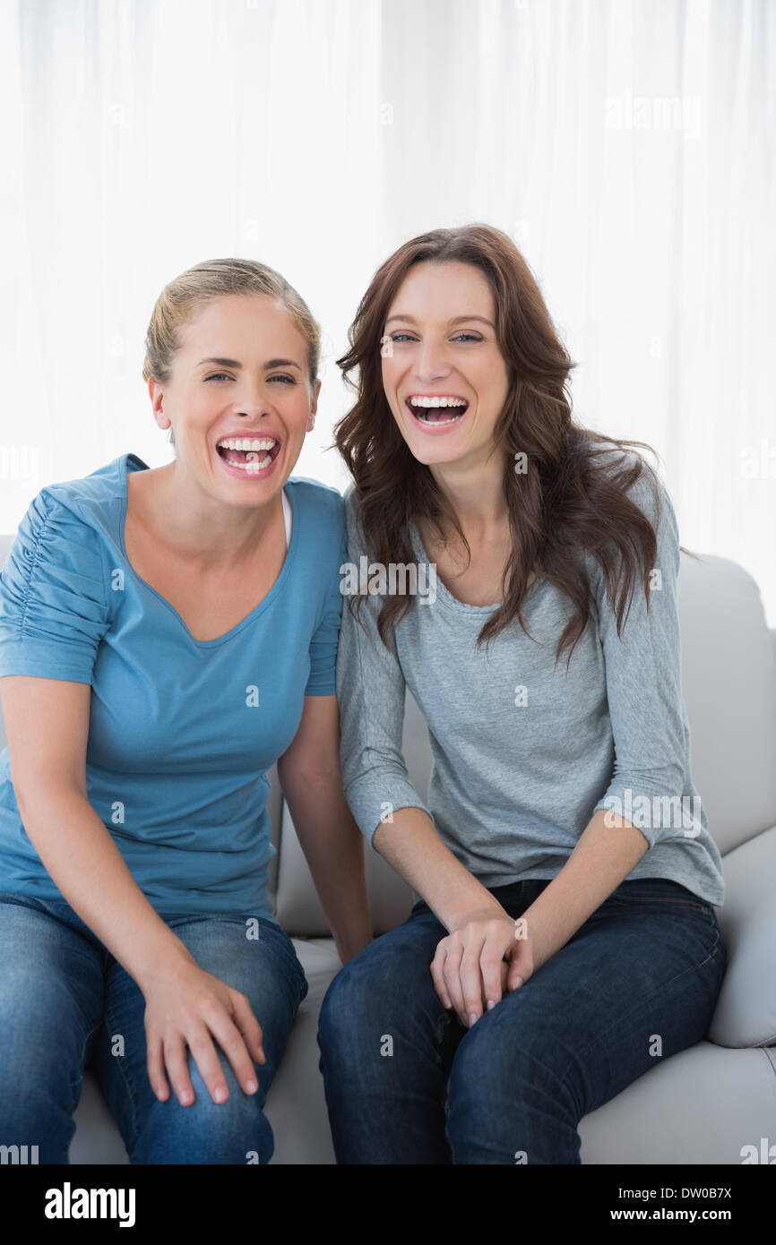 Women bursting out laughing Stock Photo - Alamy