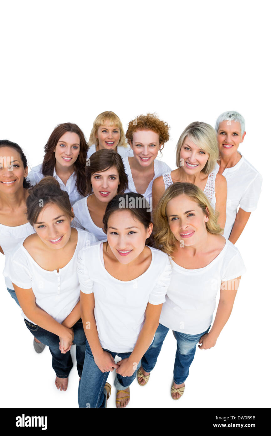 Happy female models smiling at camera Stock Photo - Alamy