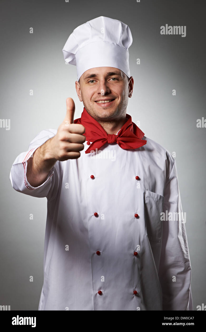 Male chef with thumb up portrait Stock Photo - Alamy