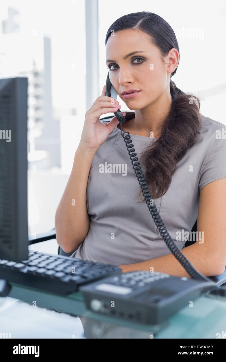 Elegant secretary sitting on chair hi-res stock photography and images ...