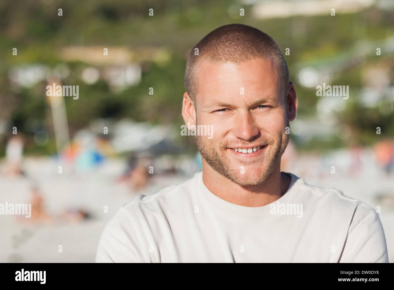 Handsome happy man posing Stock Photo - Alamy
