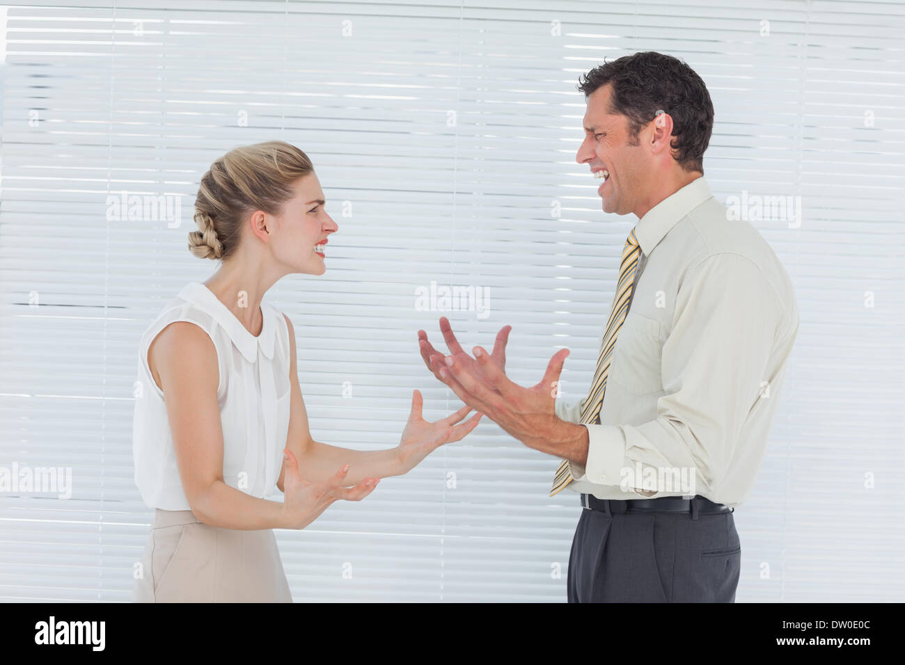 Angry young businessman having argument hi-res stock photography and ...