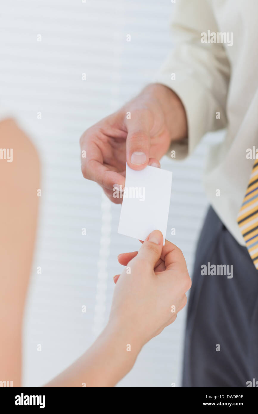 Hands exchanging business card hi-res stock photography and images - Alamy