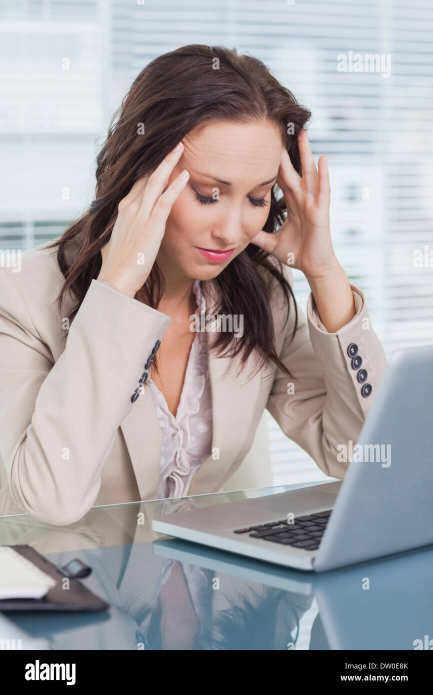 Young businesswoman laptop having headache hi-res stock photography and ...