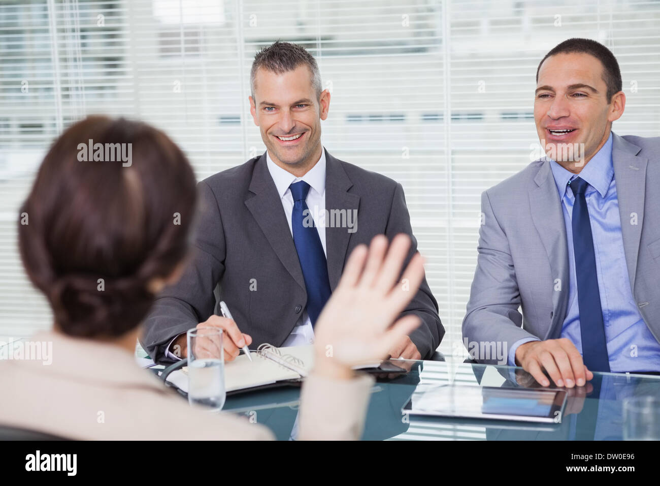 Interview panel talking together hi-res stock photography and images ...