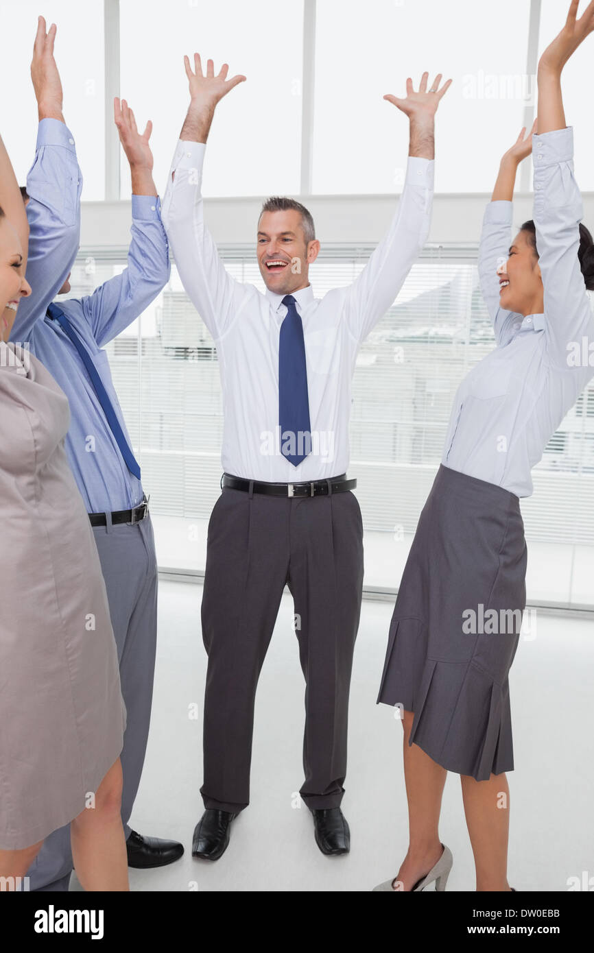 Work team cheering together hi-res stock photography and images - Alamy