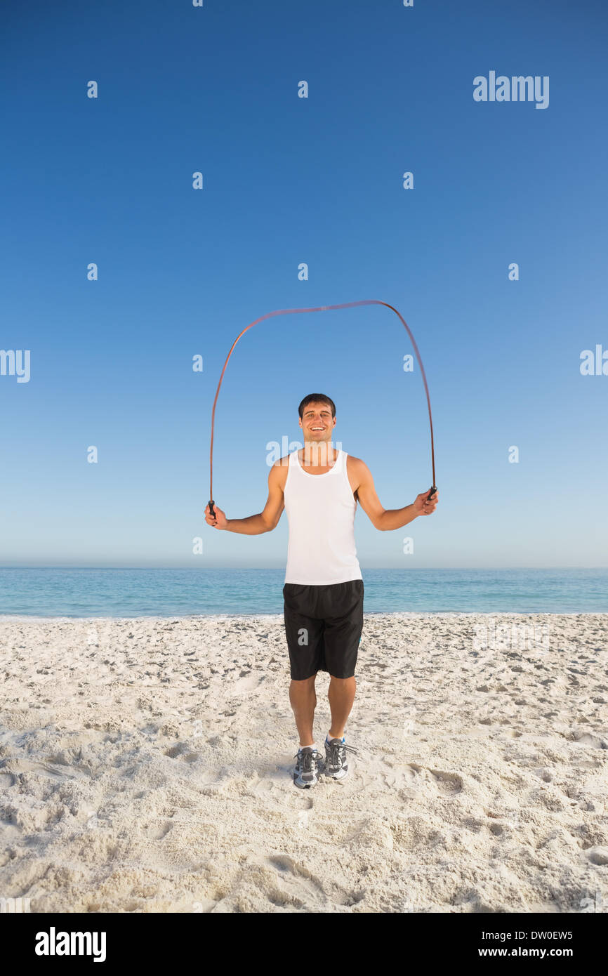 Man jumping rope and beach hi-res stock photography and images - Alamy