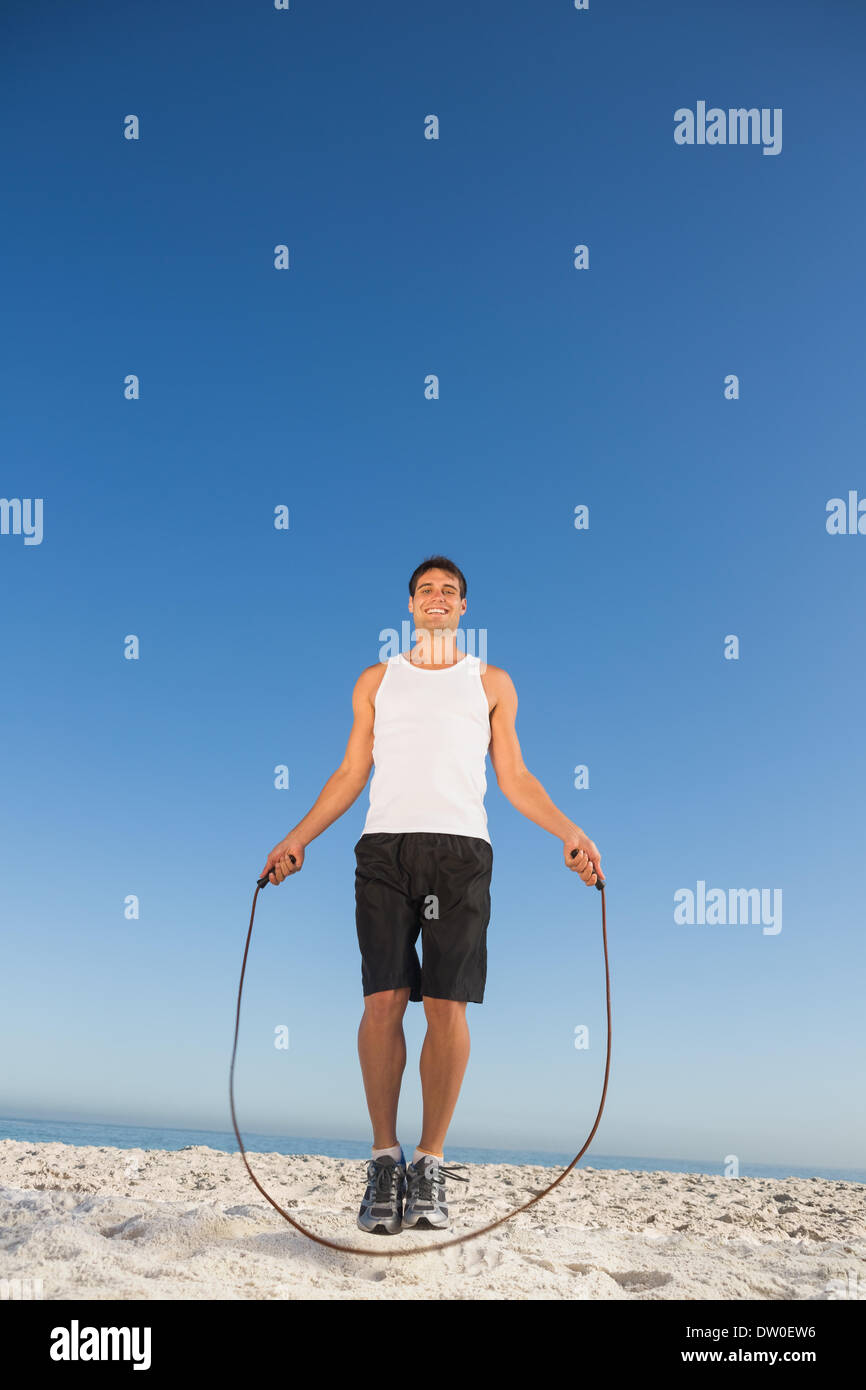 Man jumping rope and beach hi-res stock photography and images - Alamy