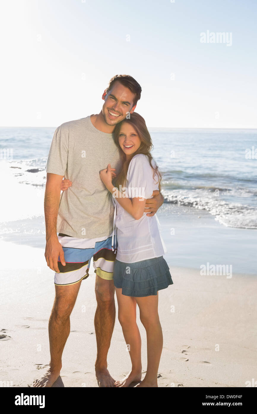 Happy couple posing together Stock Photo - Alamy