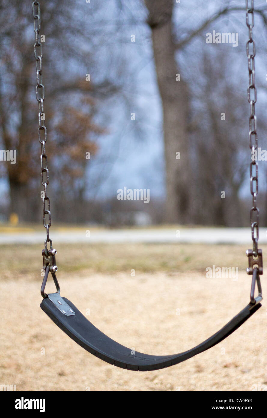 Empty motionless swing hi-res stock photography and images - Alamy
