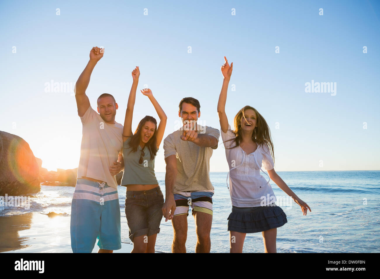 Cheerful group of friends dancing together Stock Photo - Alamy
