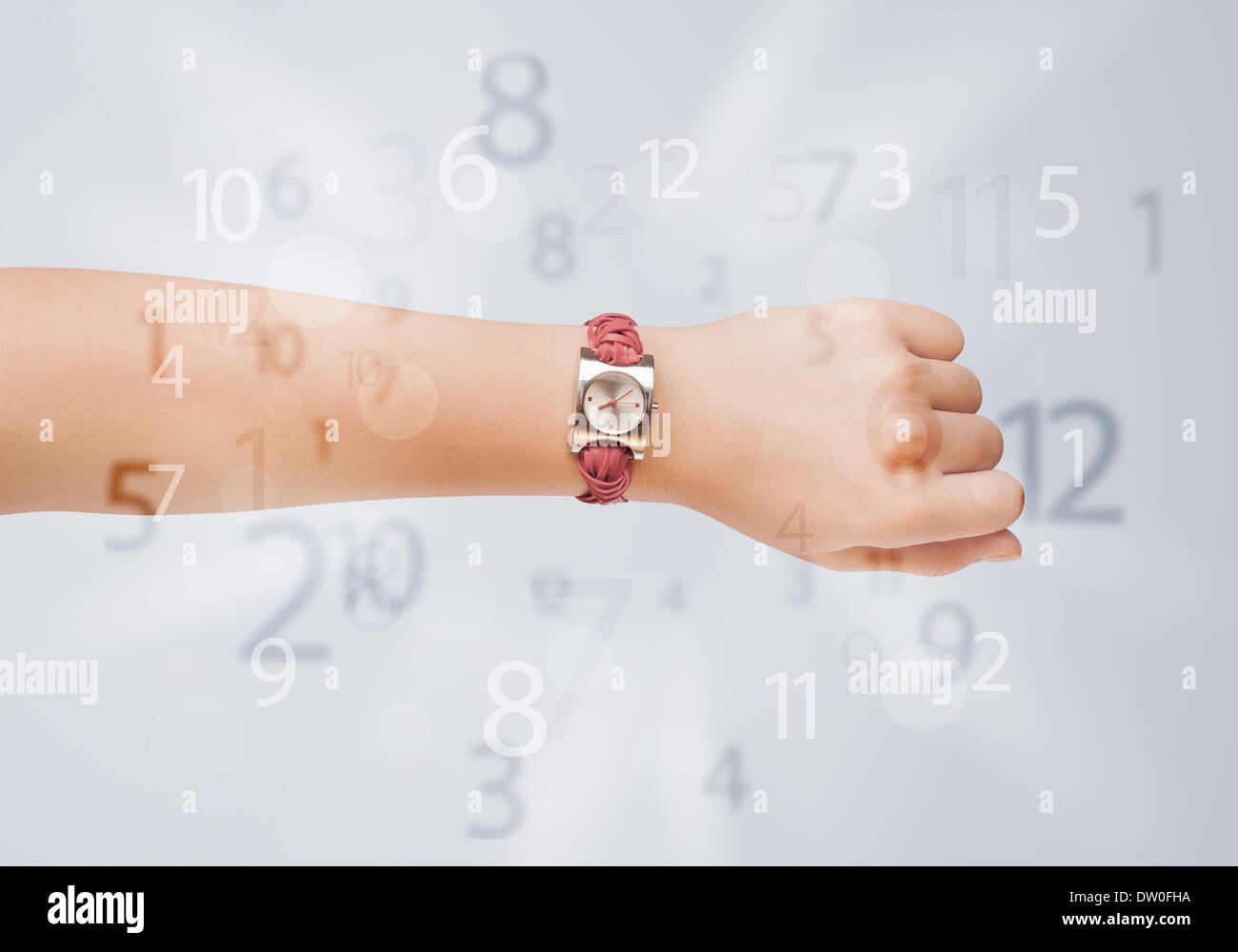 Hand with watch and numbers on the side comming out Stock Photo - Alamy