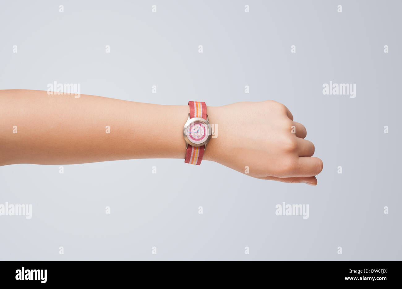 Hand with watch showing precise time Stock Photo - Alamy