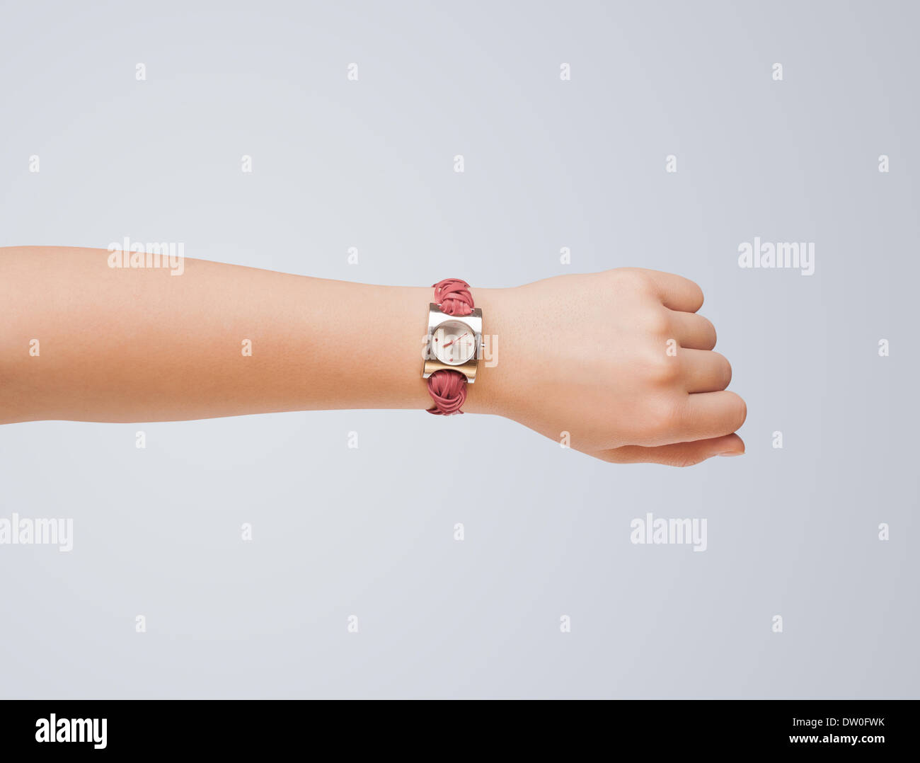 Hand with watch showing precise time Stock Photo - Alamy