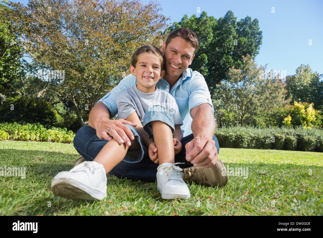 Happy father with child in a park Stock Photo - Alamy