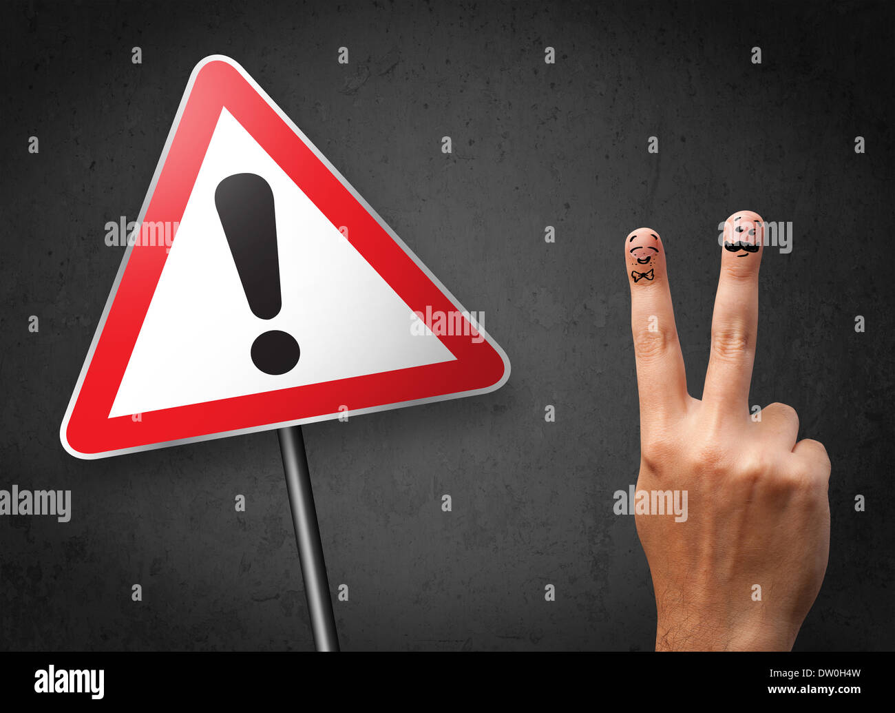 Happy smiley fingers looking at triangle warning sign with exclamation ...