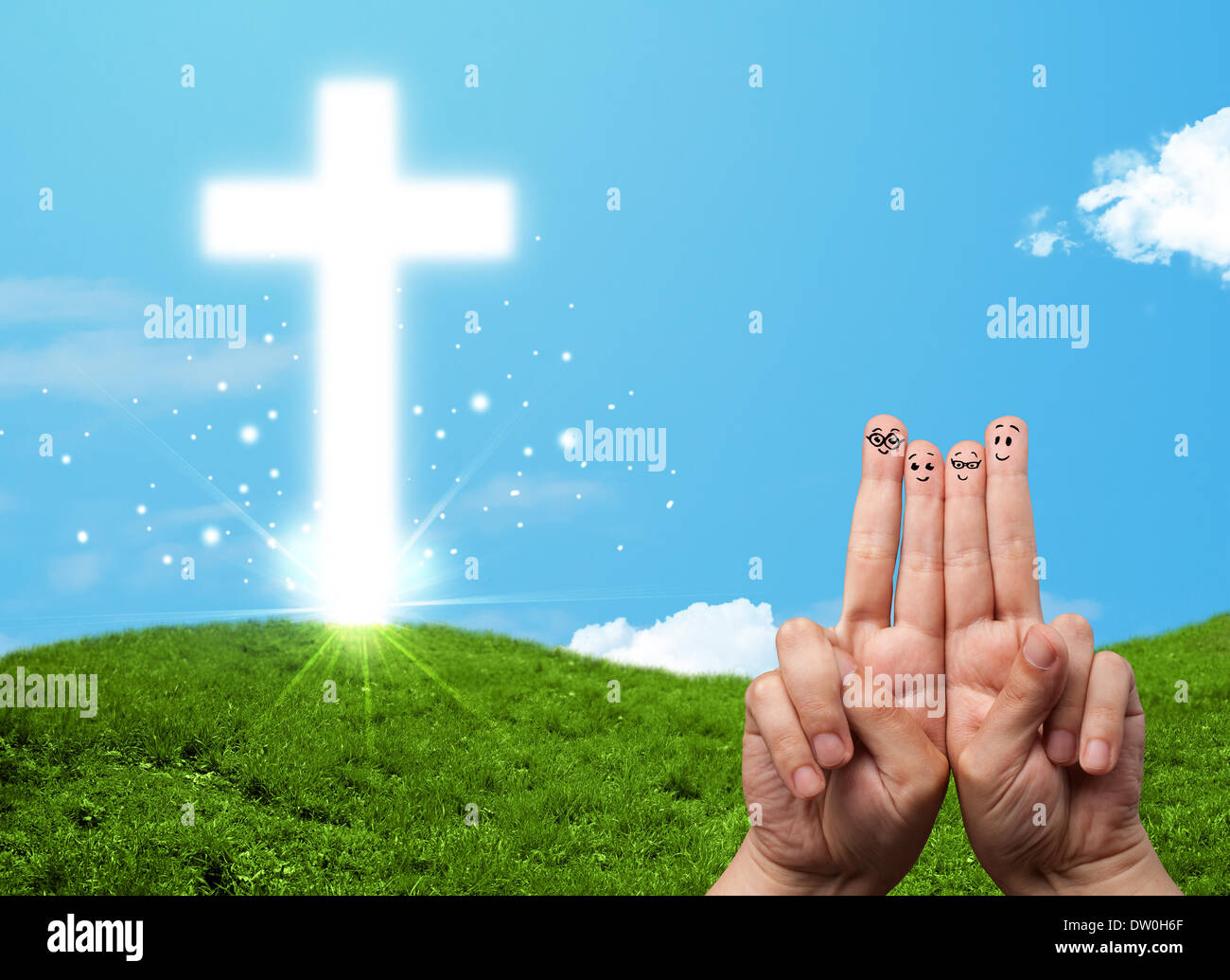 Happy finger smileys with christian religion cross Stock Photo - Alamy