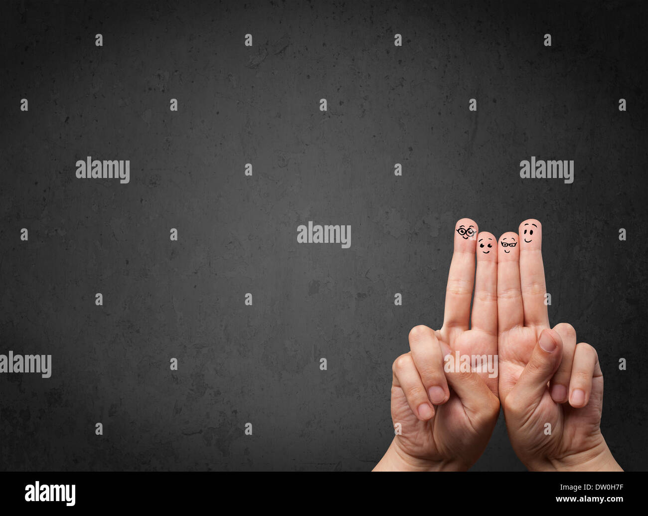 Happy finger smileys with empty copy space dark background Stock Photo ...