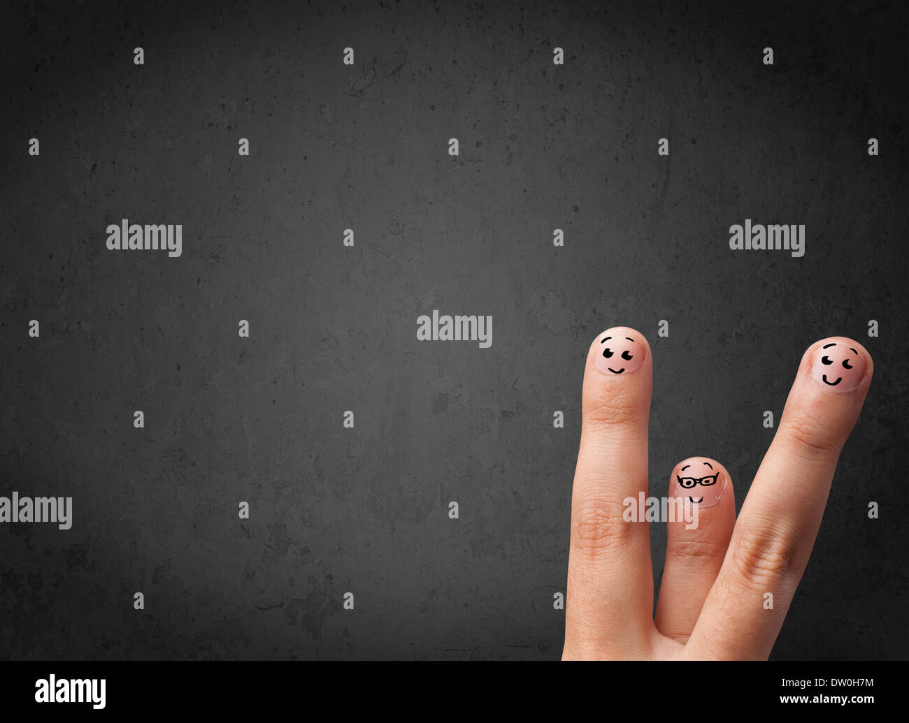 Happy finger smileys with empty copy space dark background Stock Photo ...