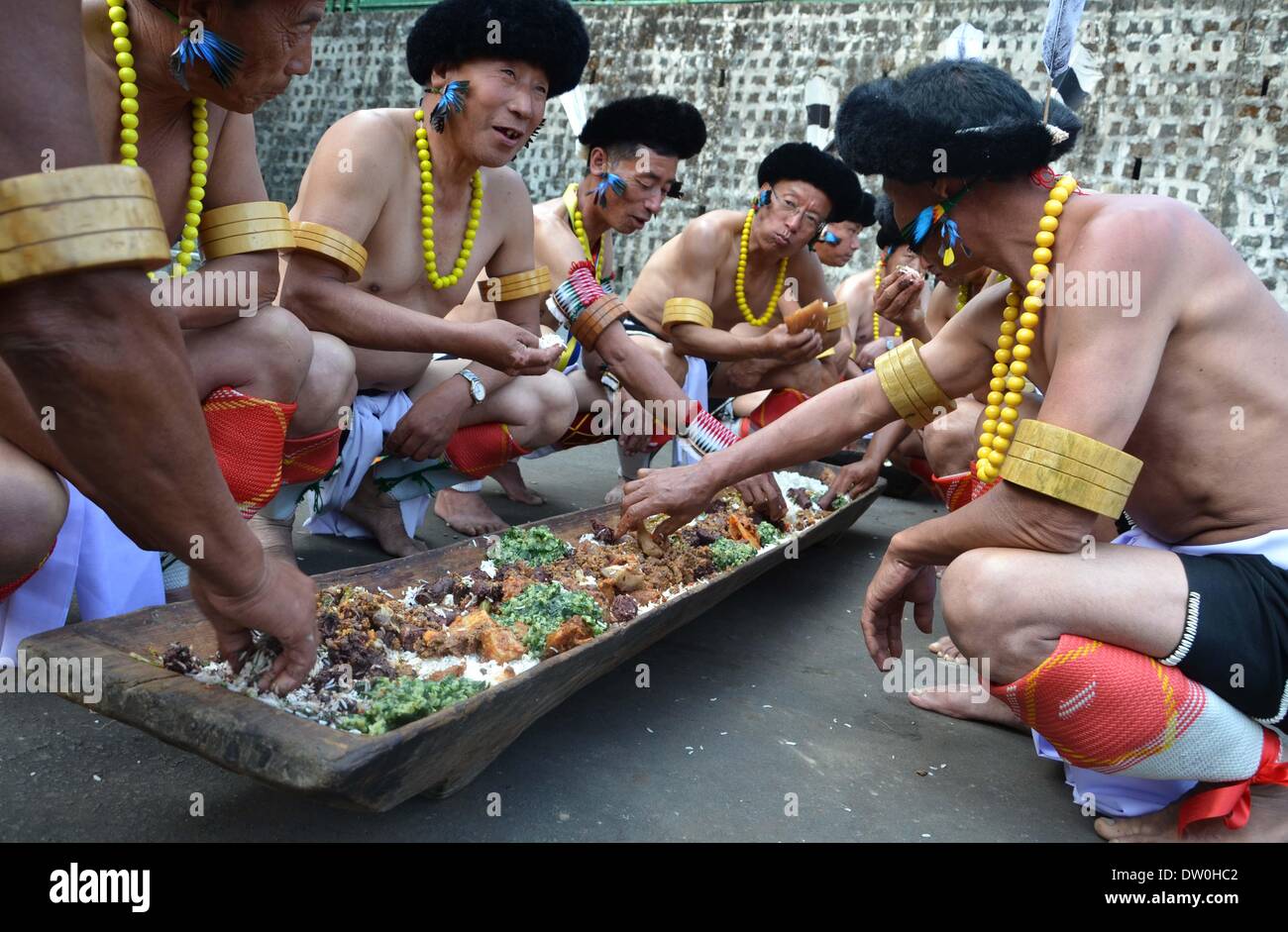Kisama, India. 25th Feb, 2012. Tribal Anagami tribesmen eats at a ...