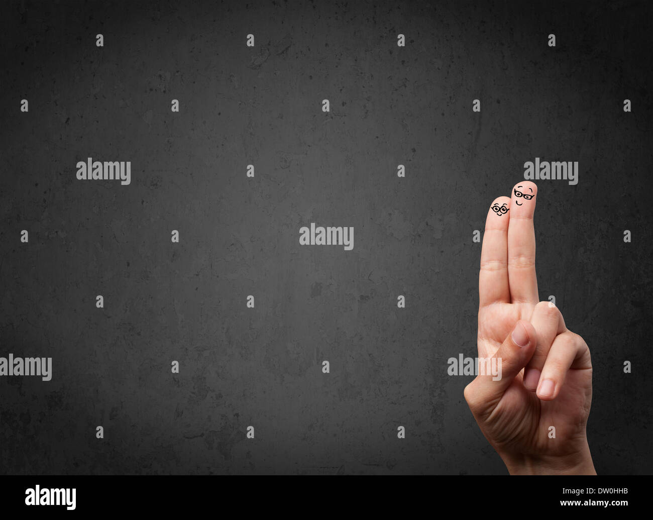 Happy finger smileys with empty copy space dark background Stock Photo ...