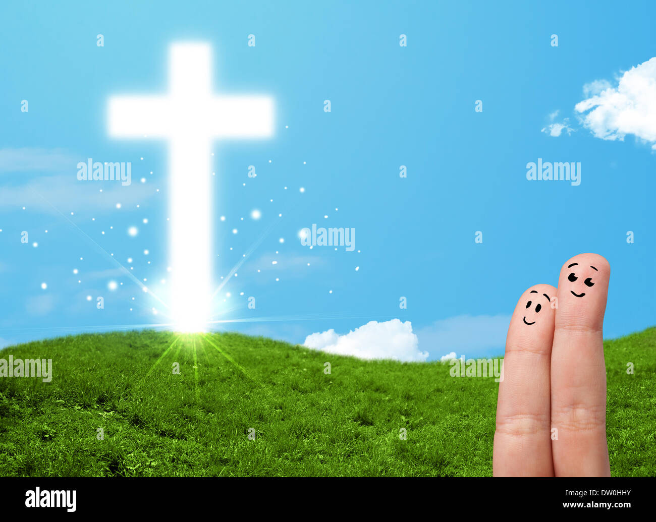 Happy finger smileys with christian religion cross Stock Photo - Alamy