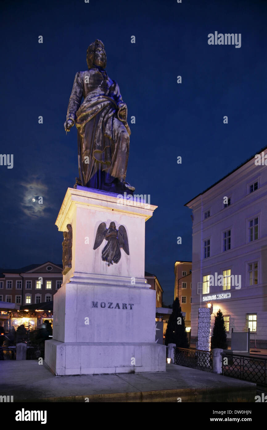 Statue of Wolfgang Amadeus Mozart with the Salzburg Museum alongside ...