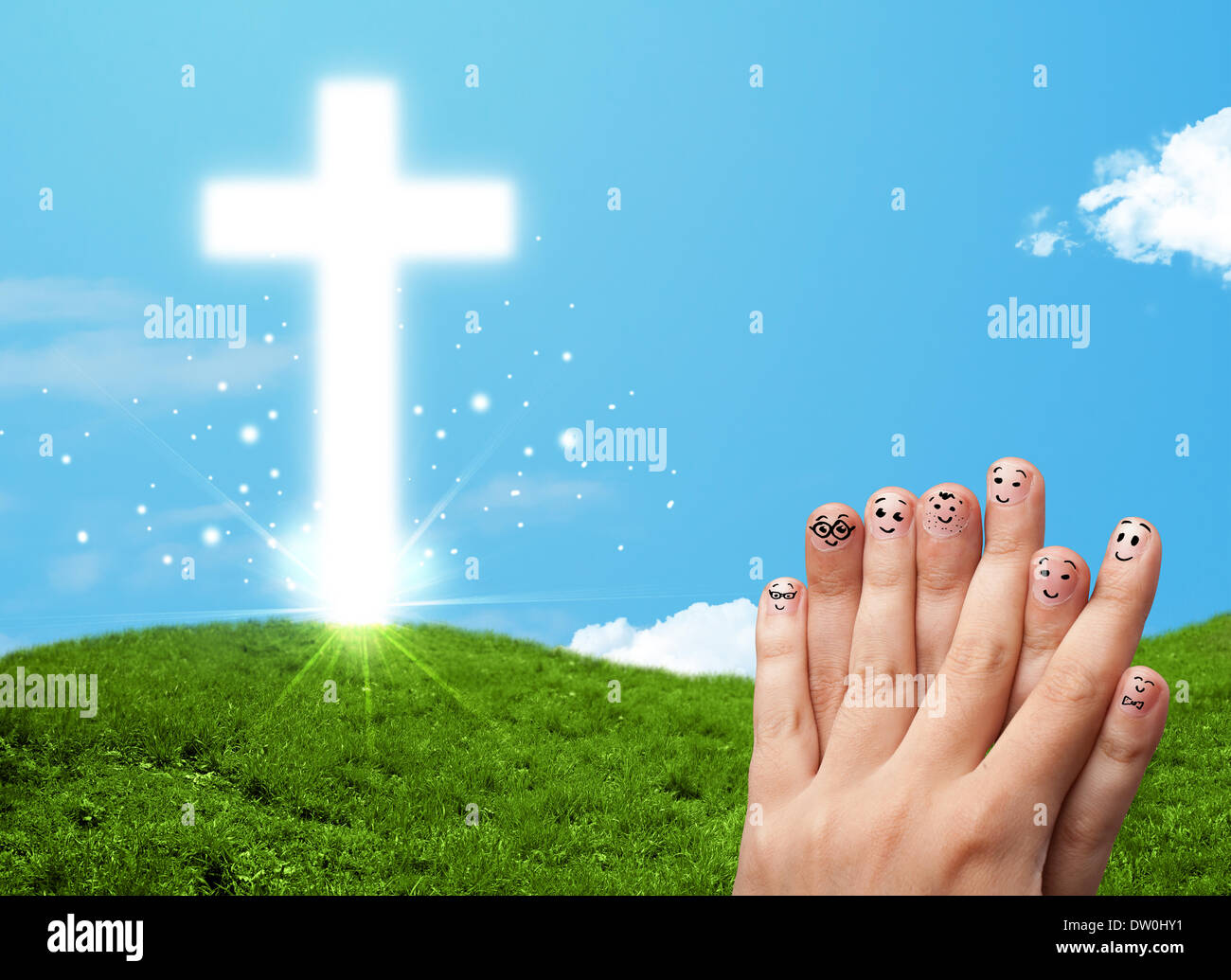 Happy finger smileys with christian religion cross Stock Photo - Alamy