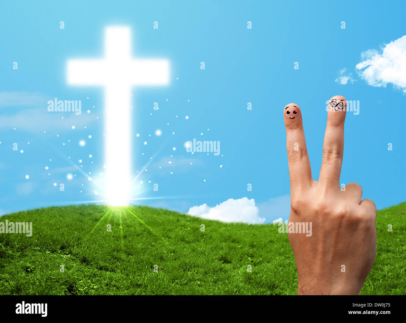 Happy finger smileys with christian religion cross Stock Photo - Alamy