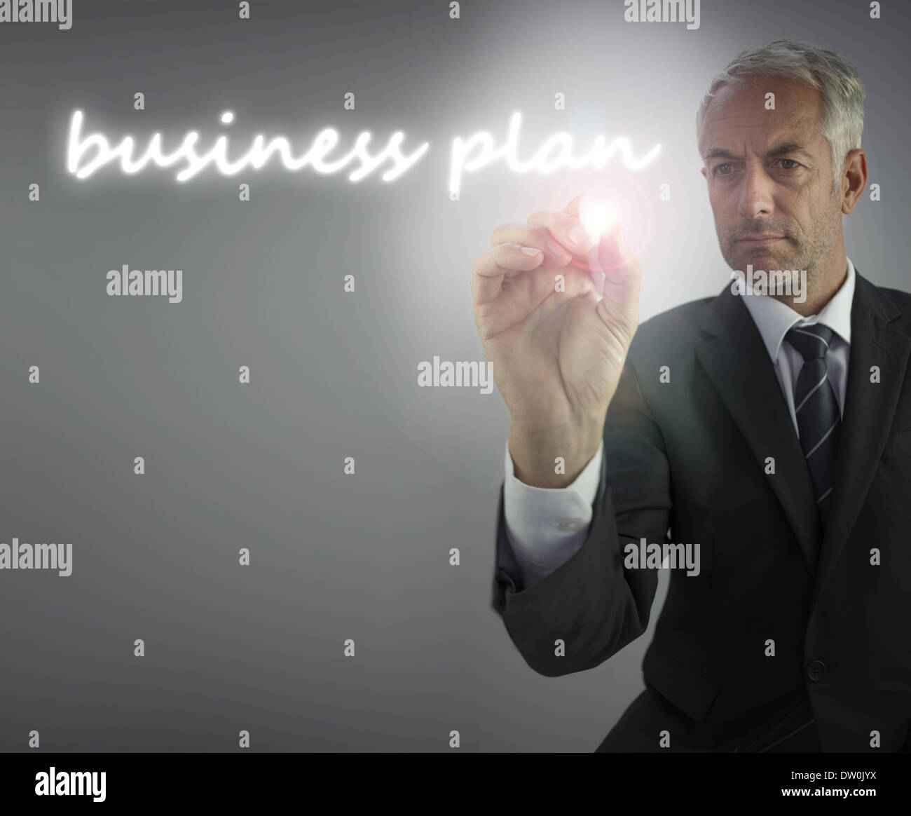 Serious businessman writing business hi-res stock photography and ...