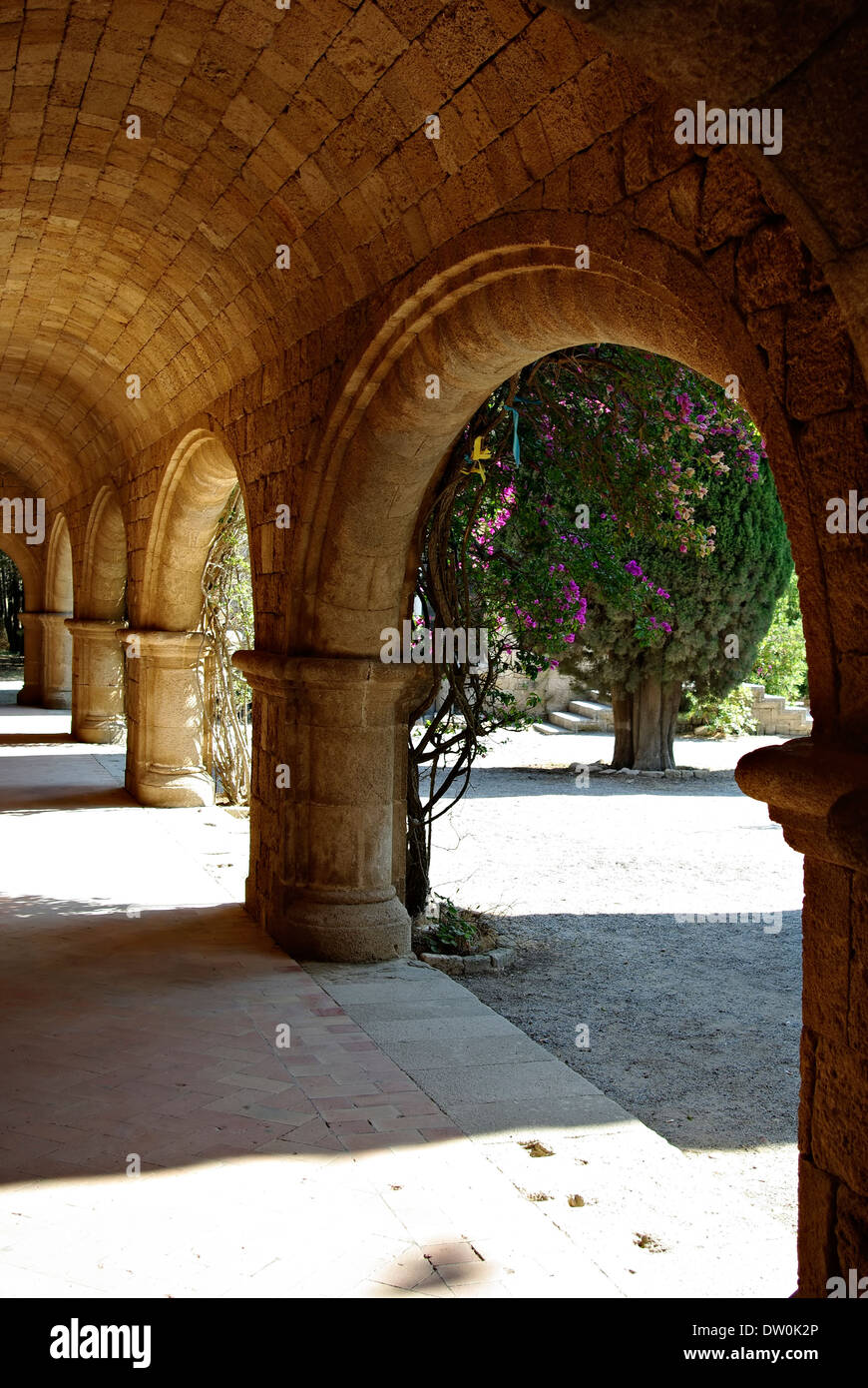 Detail of colonnade at medieval castle looking at courtyard with ...