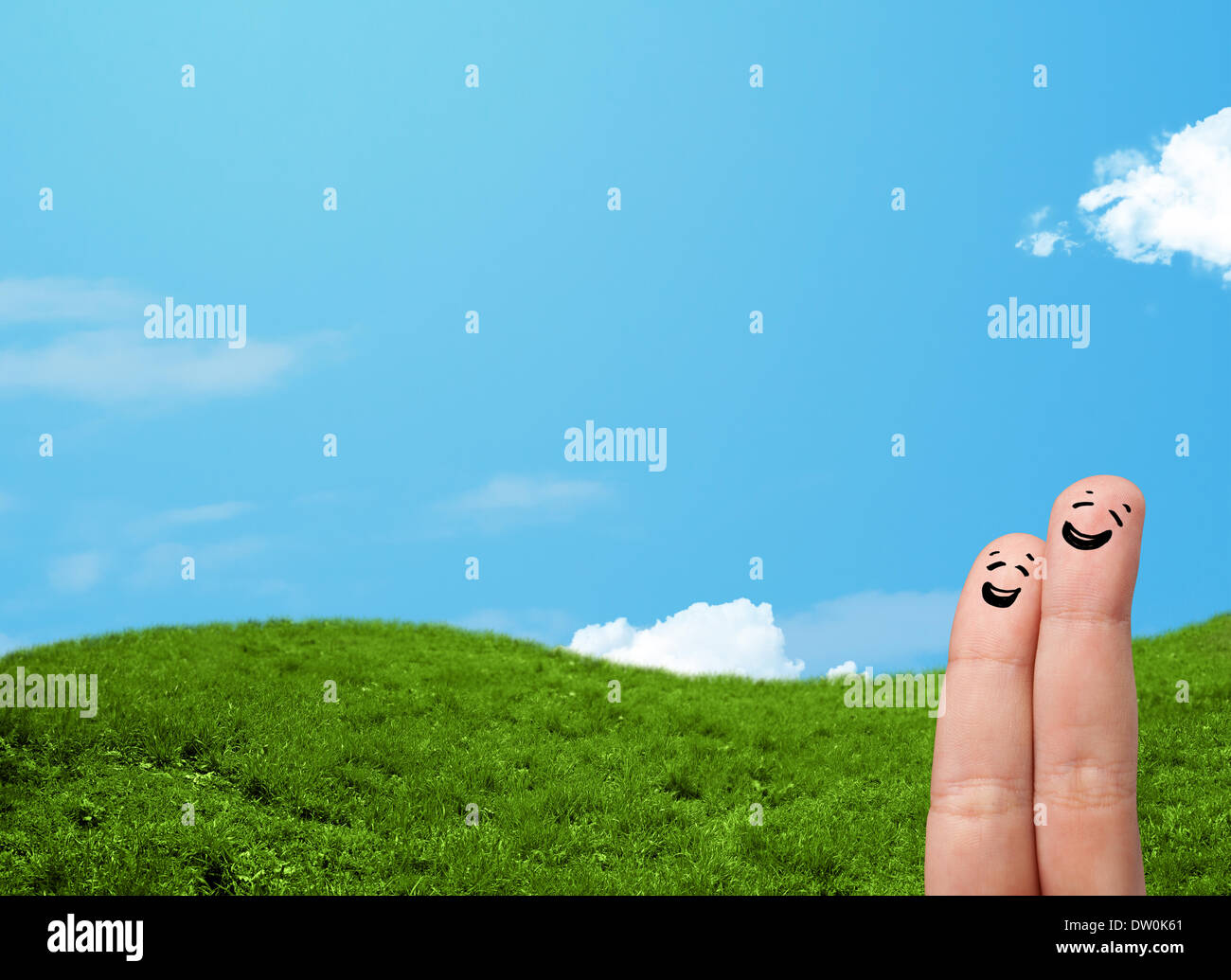 Cheerful finger smileys with landscape scenery at the background Stock ...