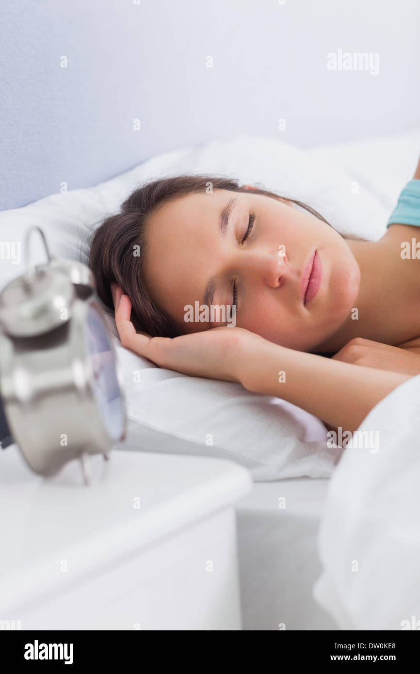 Woman peacefully sleeping in bed hi-res stock photography and images ...