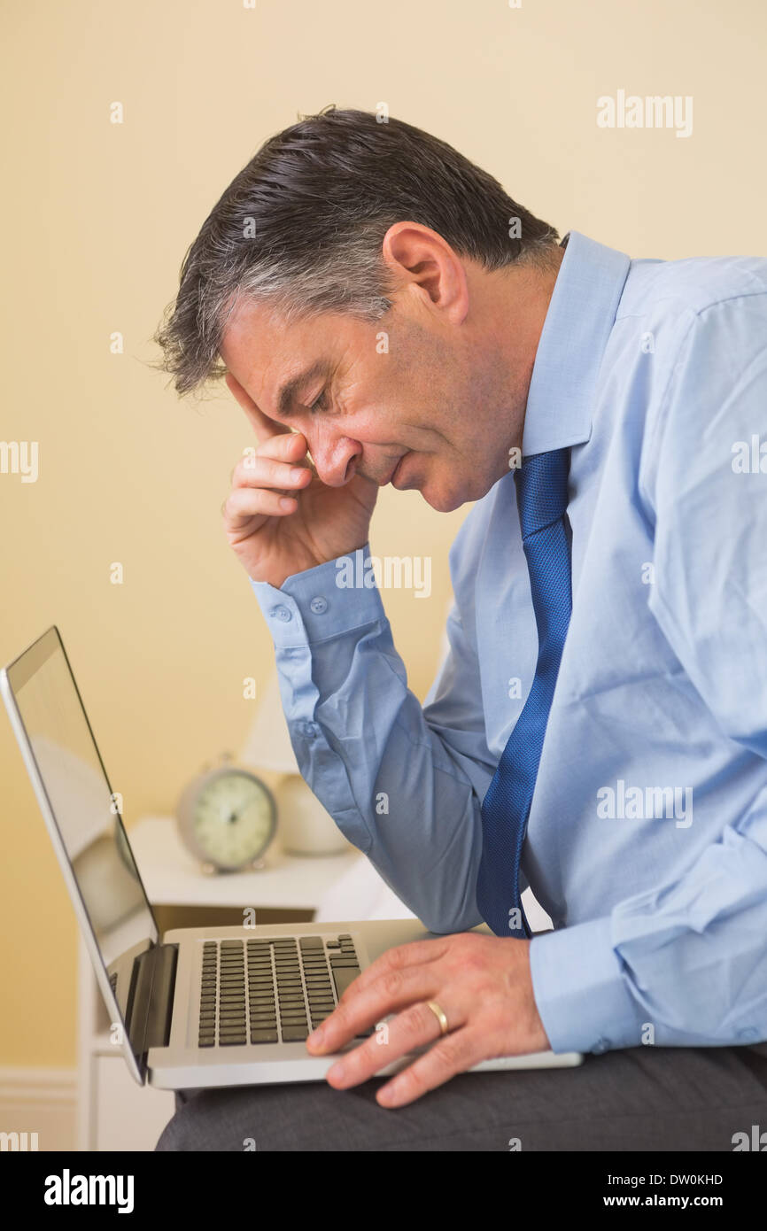 Bed laptop working stressed hi-res stock photography and images - Alamy