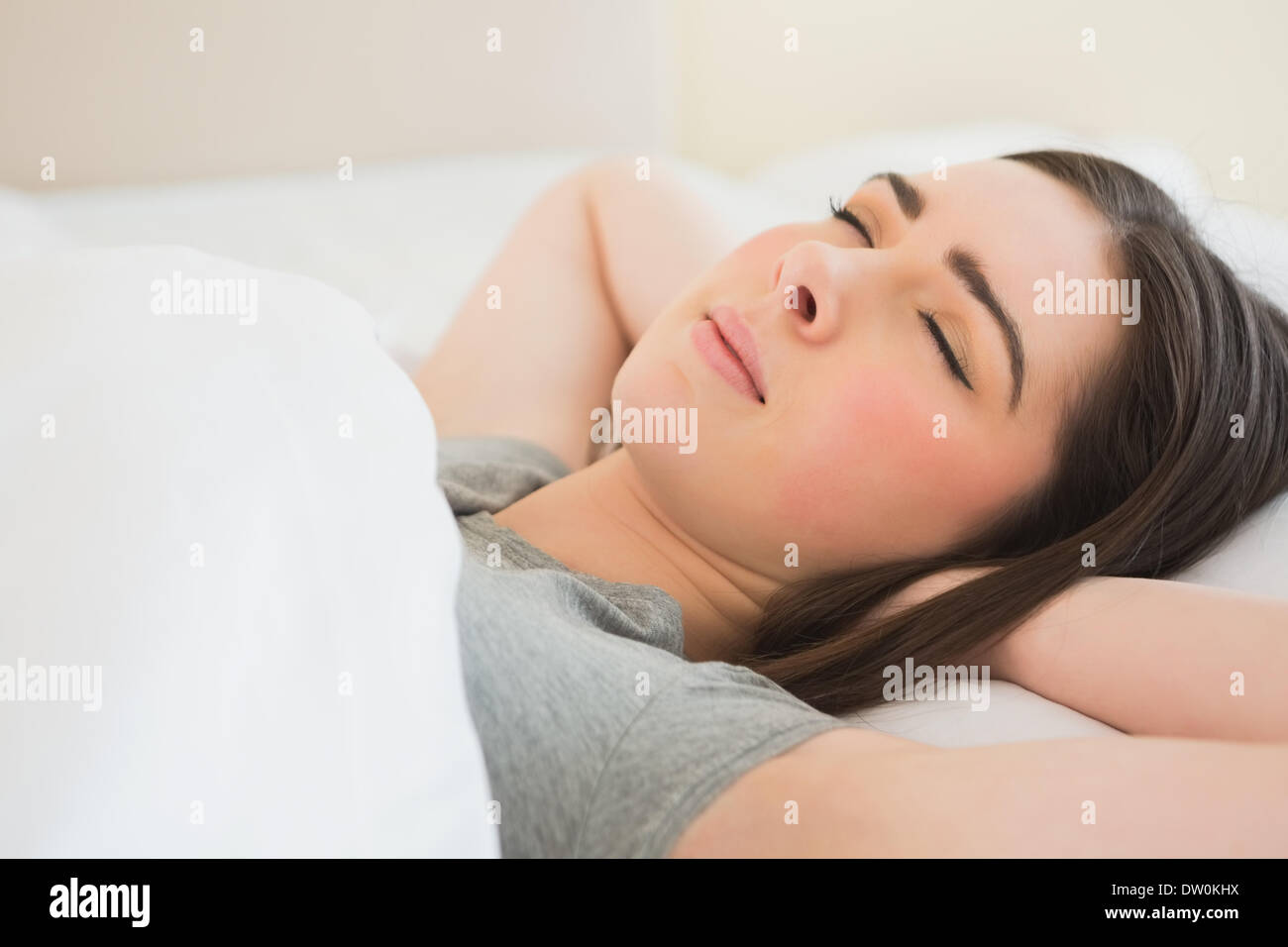 Pretty girl sleeping in her bed Stock Photo - Alamy