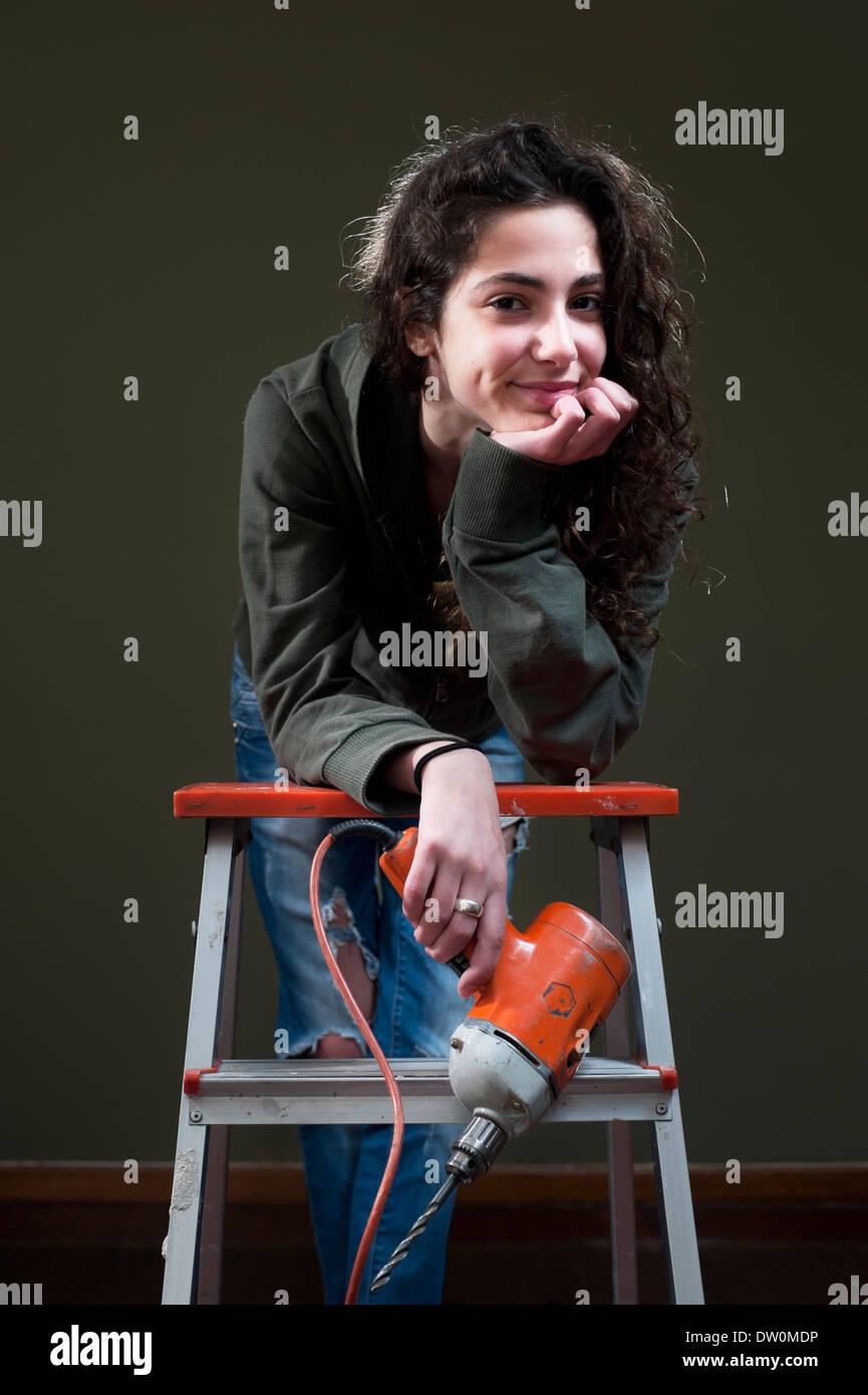 Female on stepladder hi-res stock photography and images - Alamy