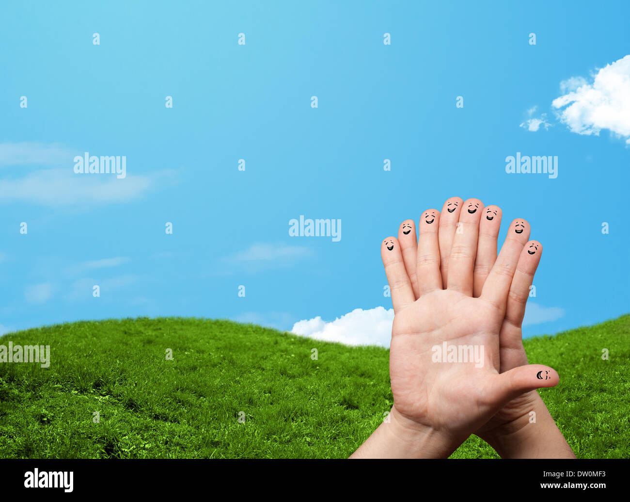 Cheerful finger smileys with landscape scenery at the background Stock ...